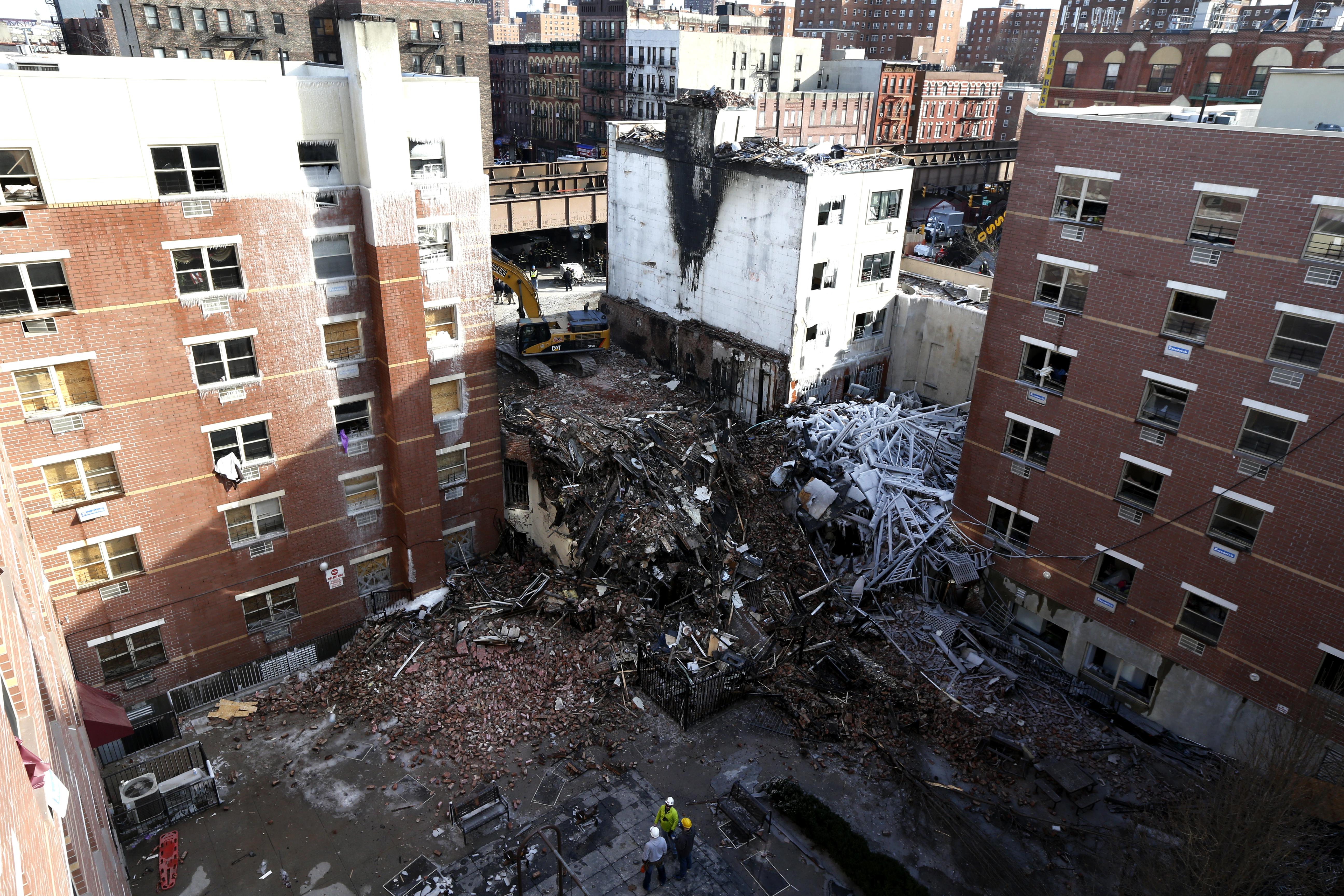 Rubble is seen Friday, March 14, 2014, two days after a natural gas ...